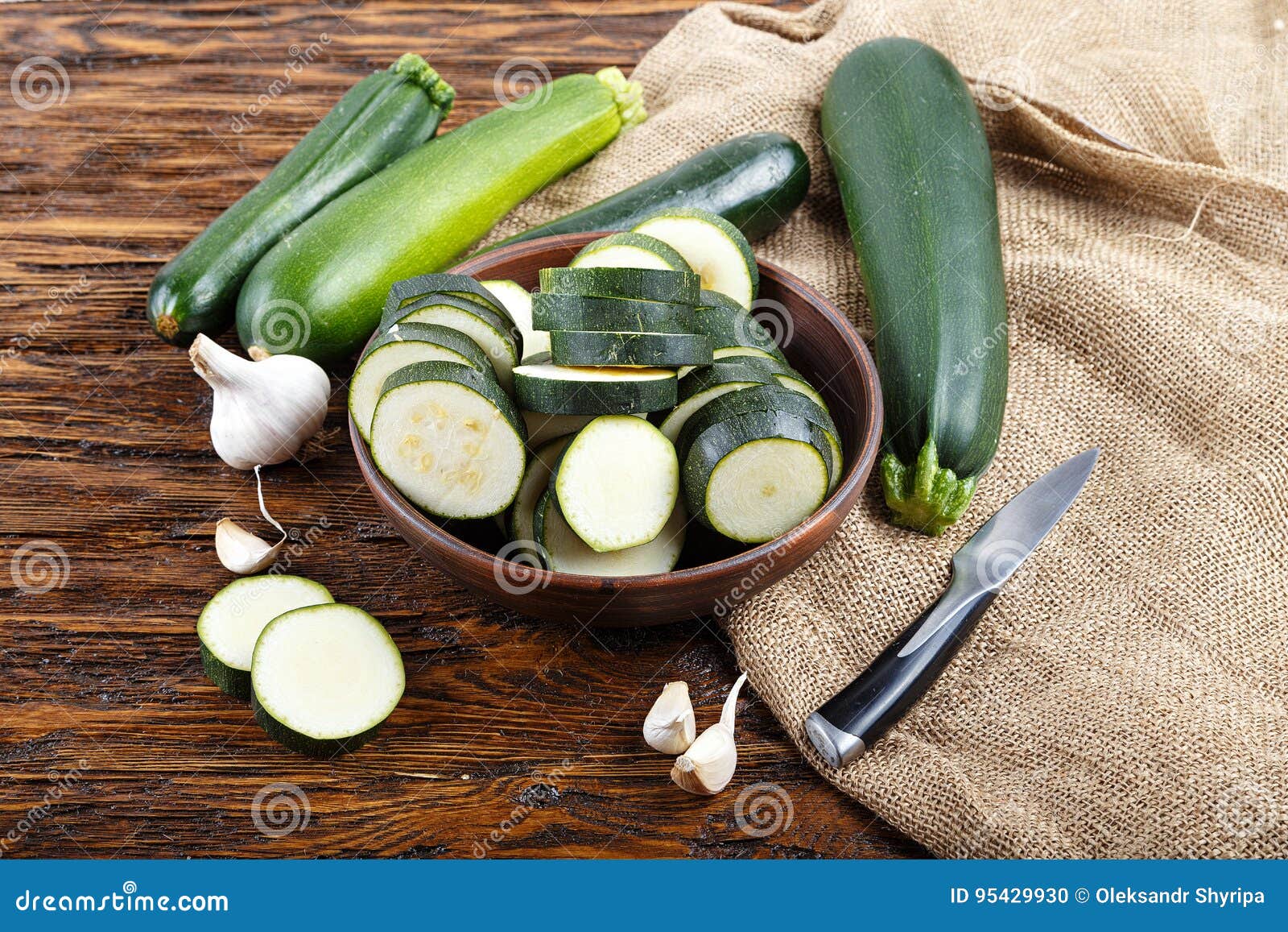 Cut courgettes with garlic stock photo. Image of heap - 95429930