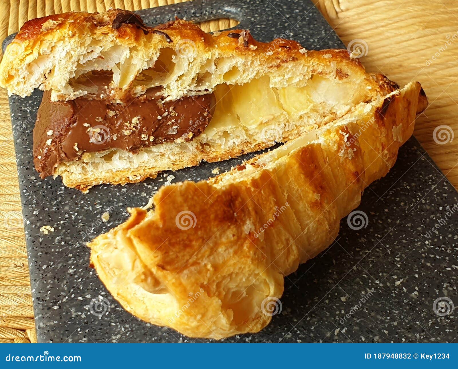 Cut croissant halves stock photo. Image of chocolate - 187948832