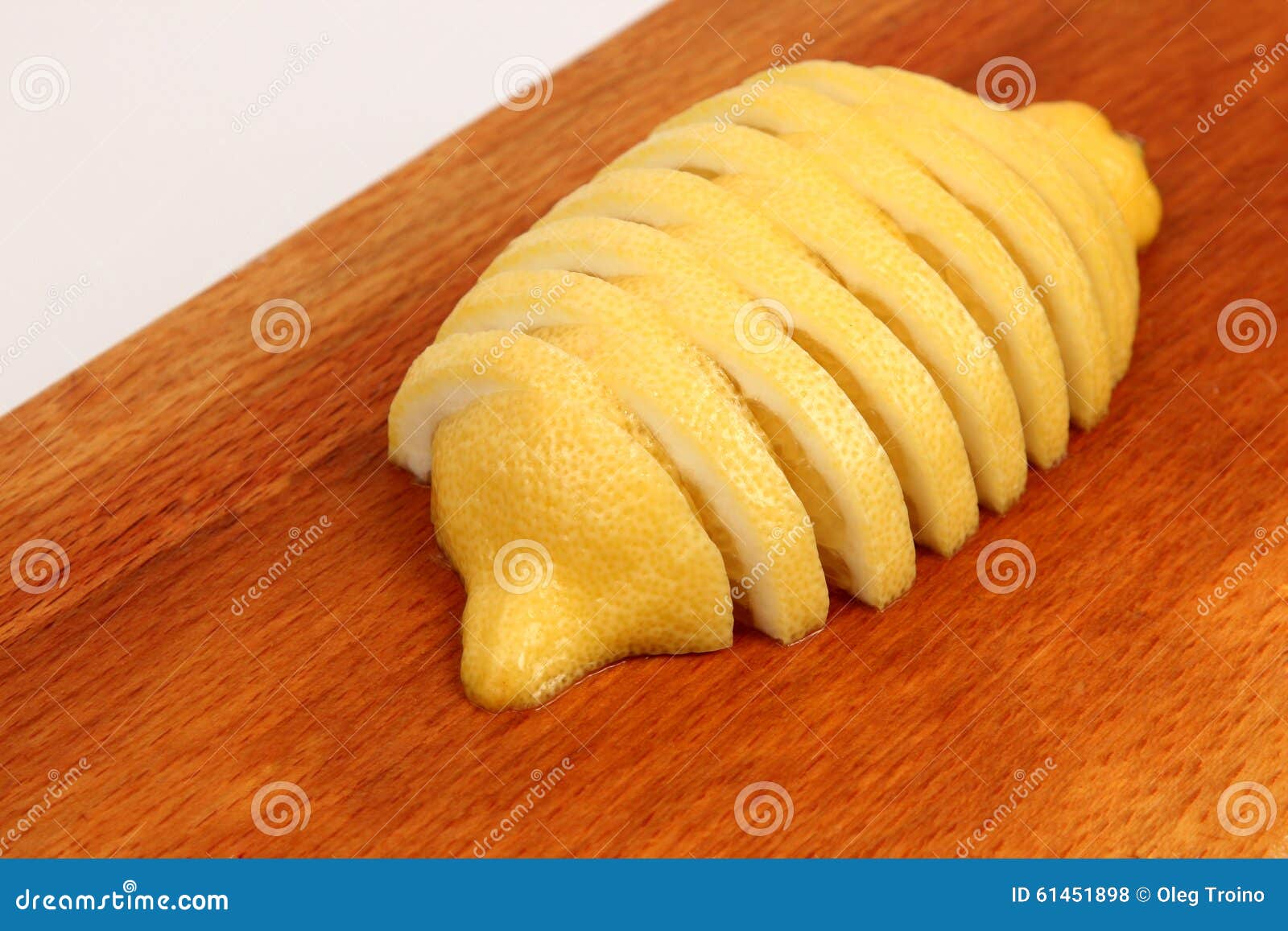 Cut Crosswise Into Slices A Lemon On A White Background Stock Photo ...