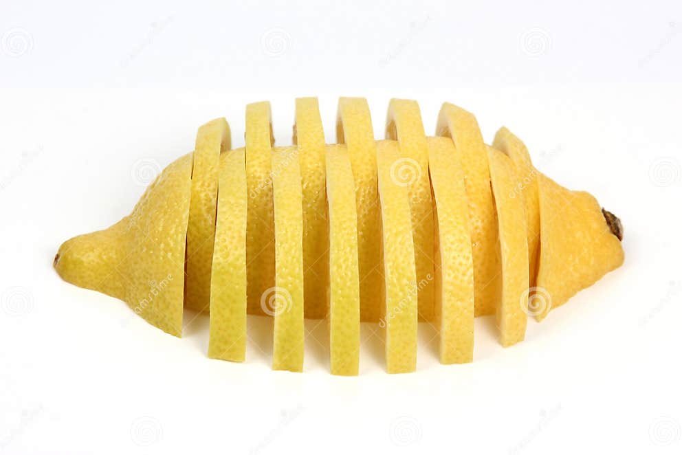 Cut Crosswise into Slices a Lemon on a White Background Stock Photo ...