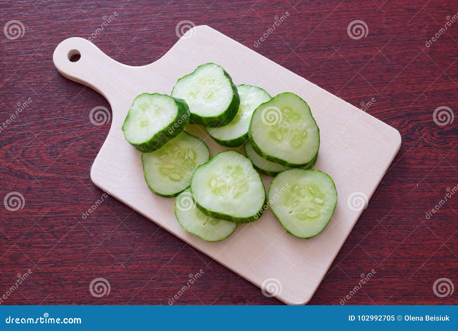 Cut Cucumber on a Wooden Cutting Board. Step by Step Cooking Stock ...