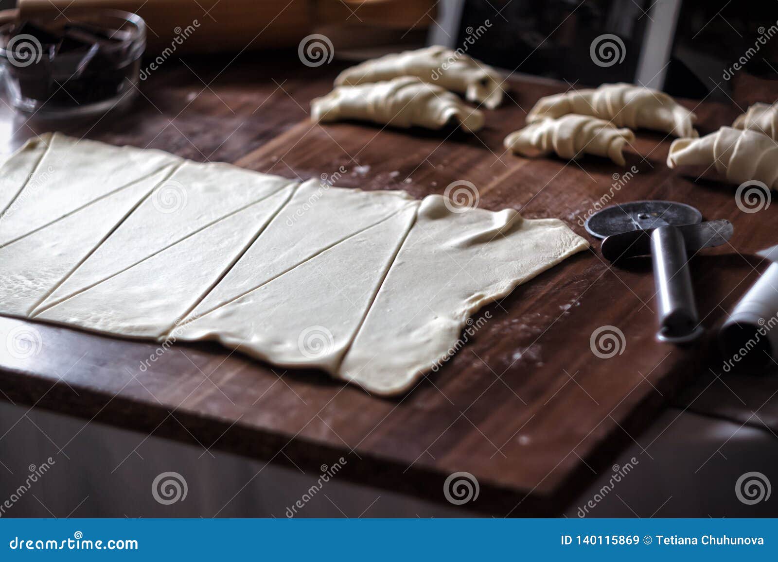 Cut the Dough into Triangles for Croissants with Chocolate Stock Image ...