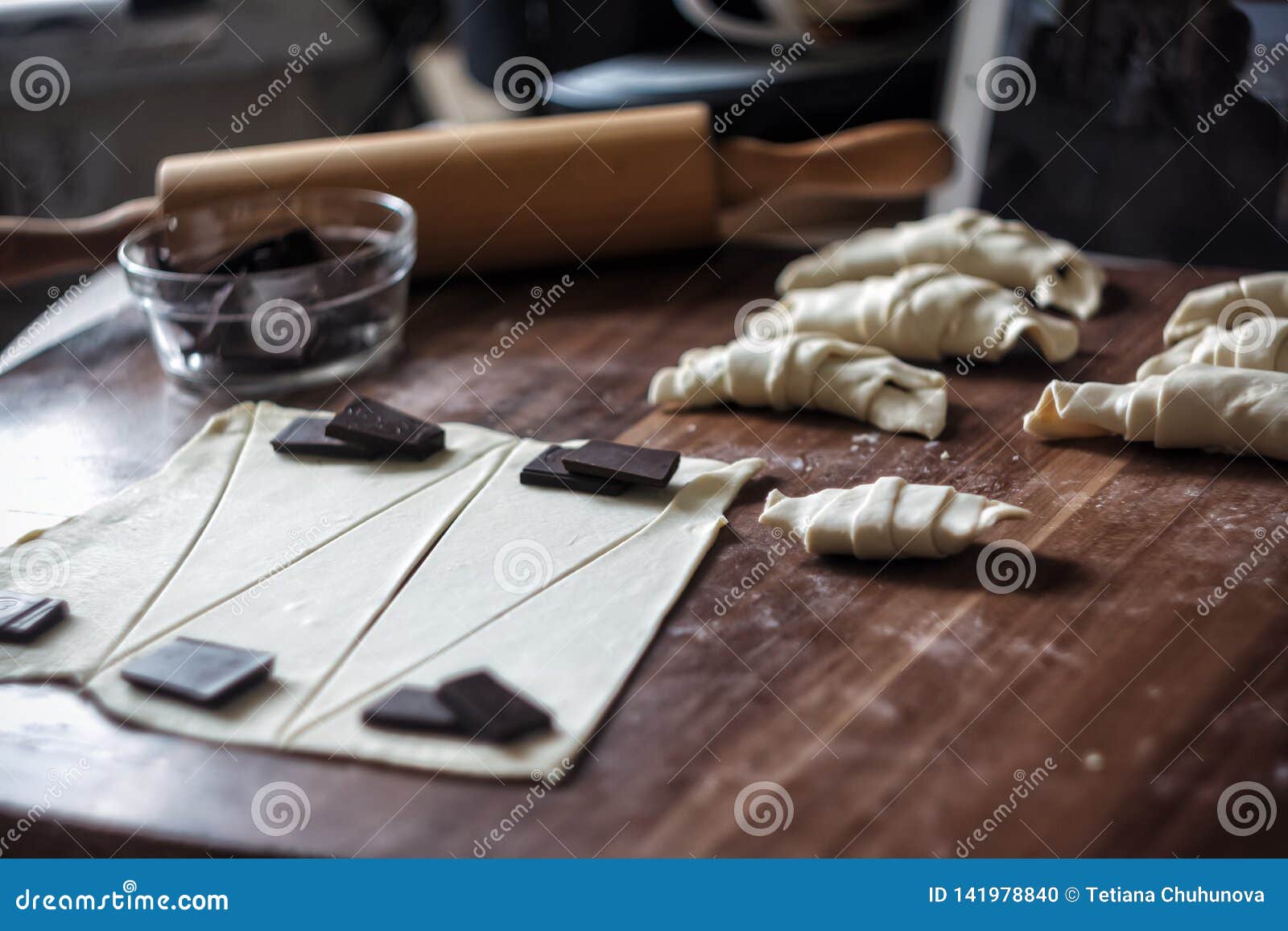 Cut the Dough into Triangles for Croissants with Chocolate Stock Photo ...