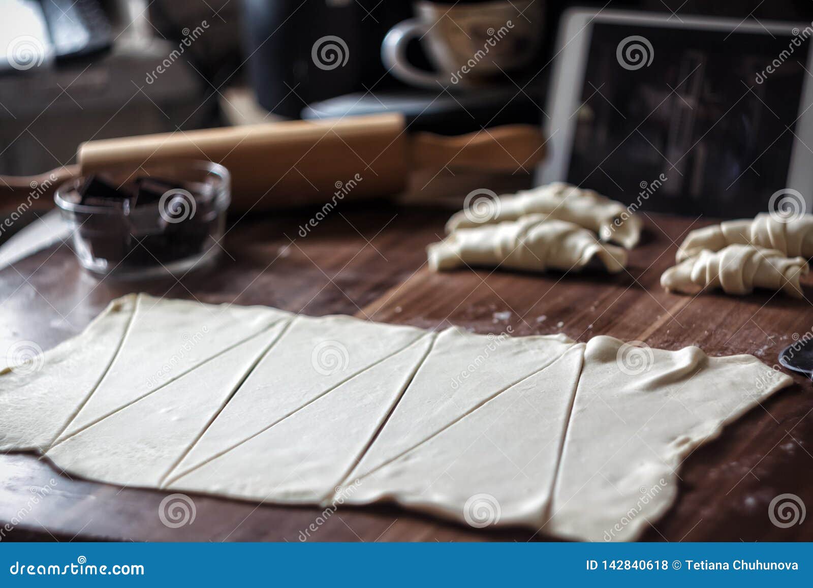 Cut the Dough into Triangles for Croissants with Chocolate Stock Photo ...