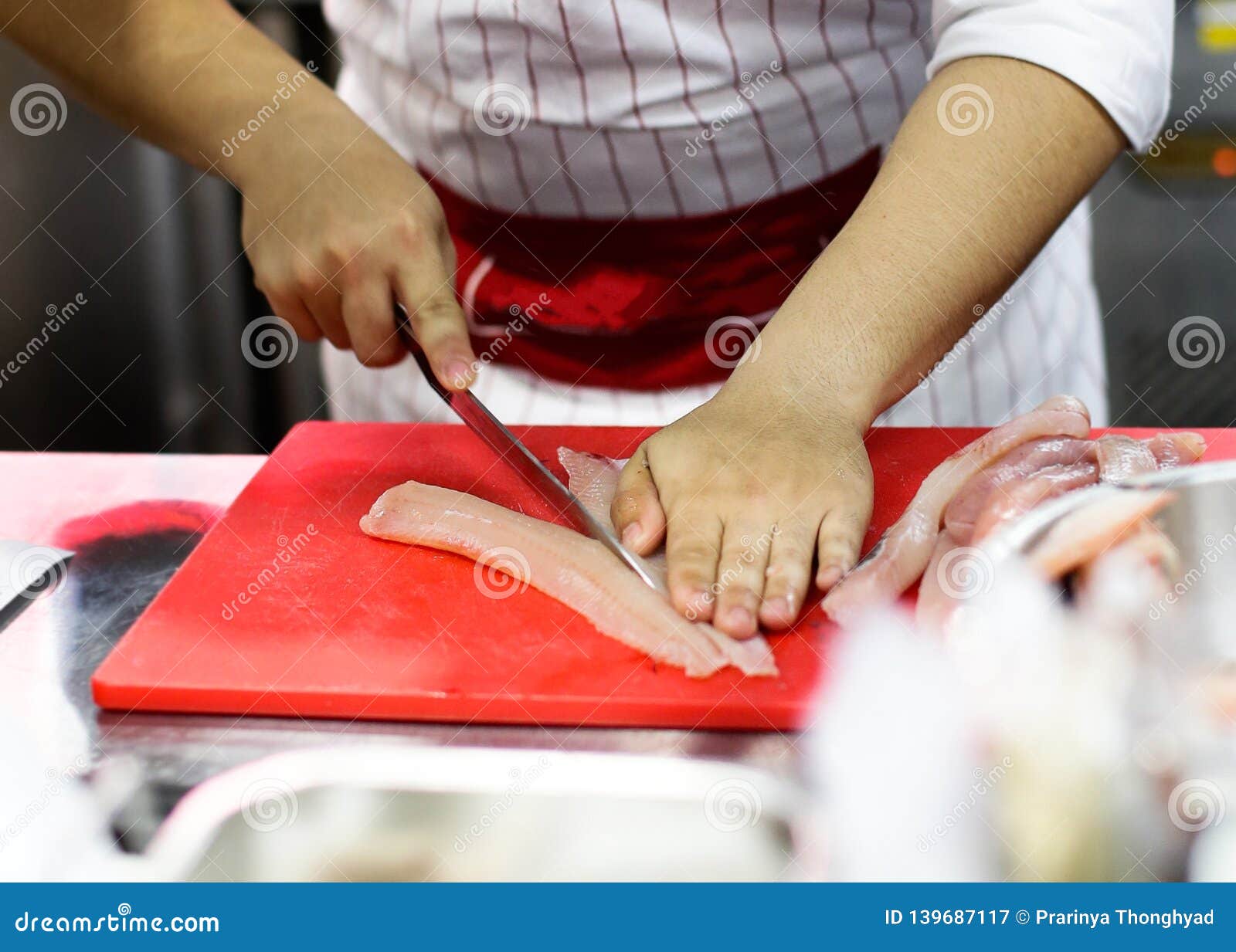 Cut Fish Fillet in a Fish Shop, Chef Cutting Fish in the Kitchen Stock ...