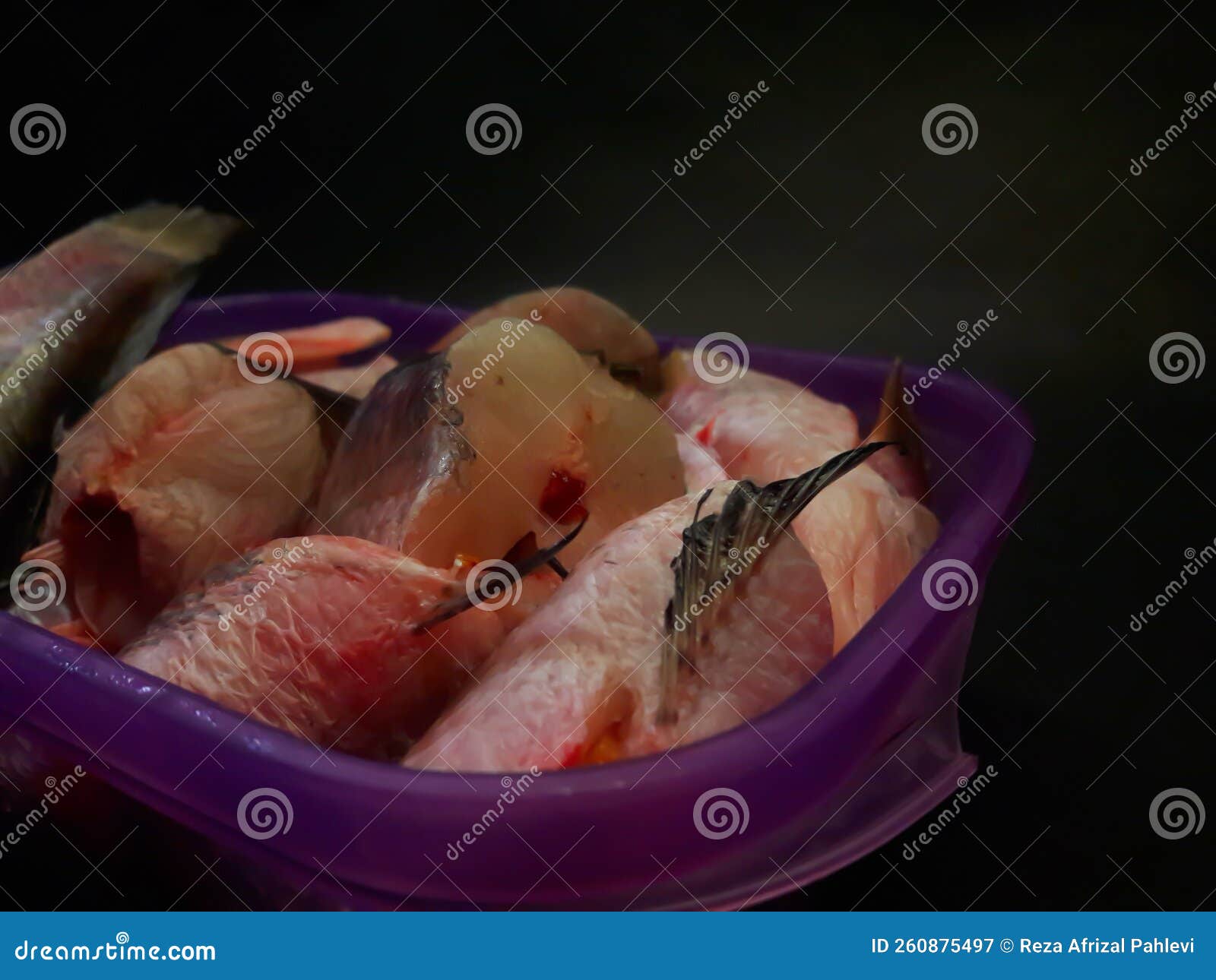 Cut Fresh Fish Meat in a Purple Container Stock Image - Image of meat ...