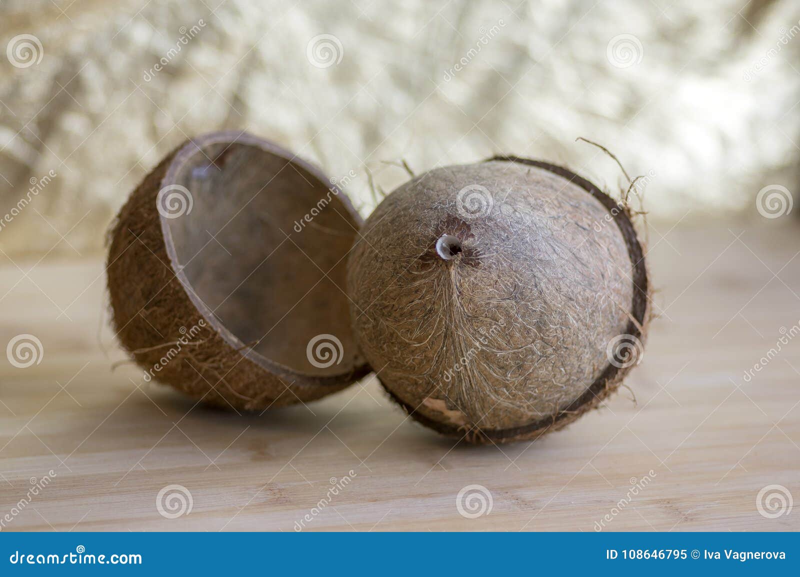 Full Coconut with Nutshells on Wooden Bamboo Table Stock Image - Image ...