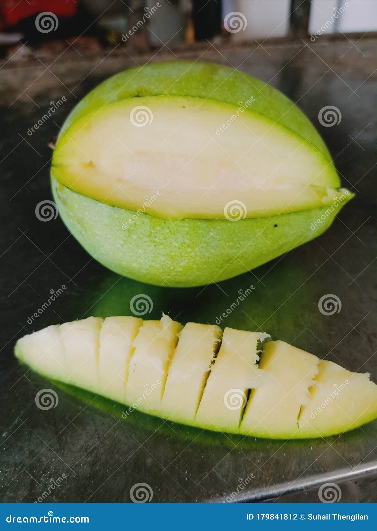 Cut of green mango stock photo. Image of leaf, tree - 179841812