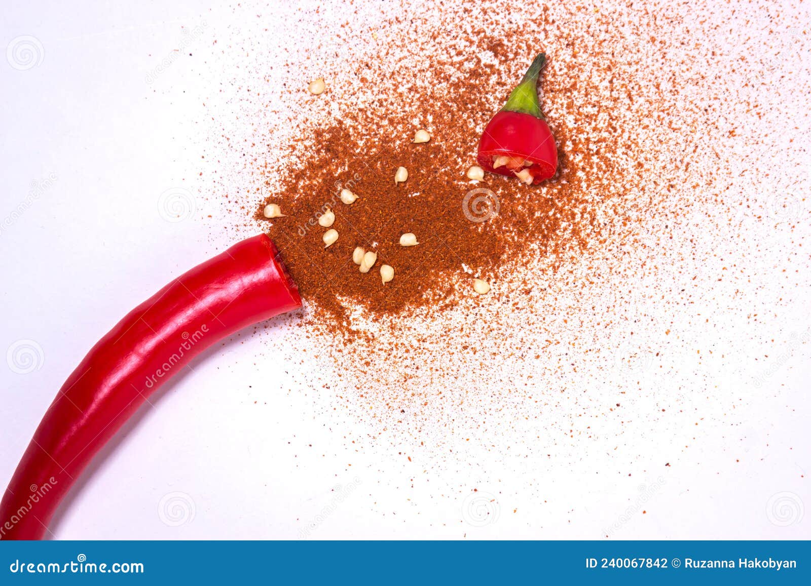 Cut in Half Red Chili Peppers with Ground Red Chili Peppers Stock Photo ...