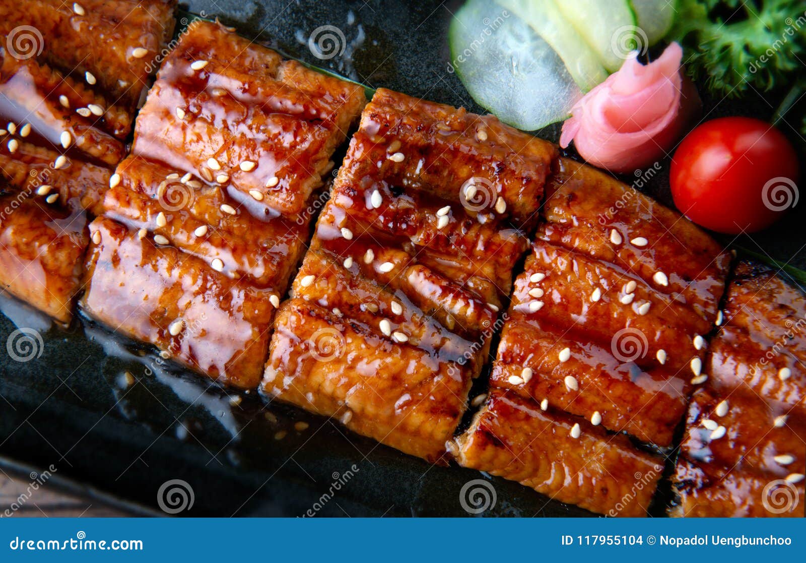 Cut grilled Japanese eel. stock photo. Image of ibaraki - 117955104