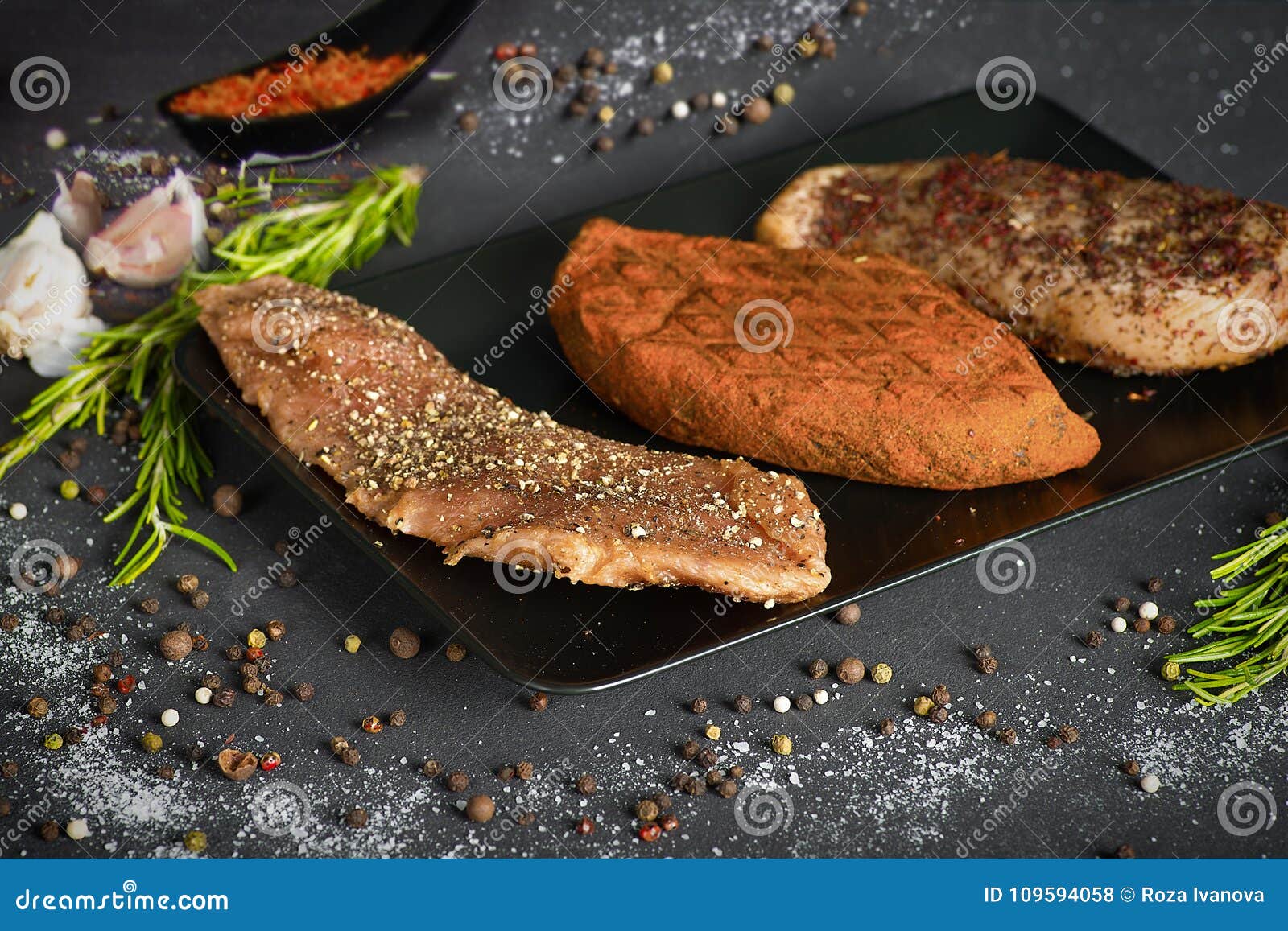 The Cut Meat on Black Rectangular Plate Stock Photo - Image of paprika ...