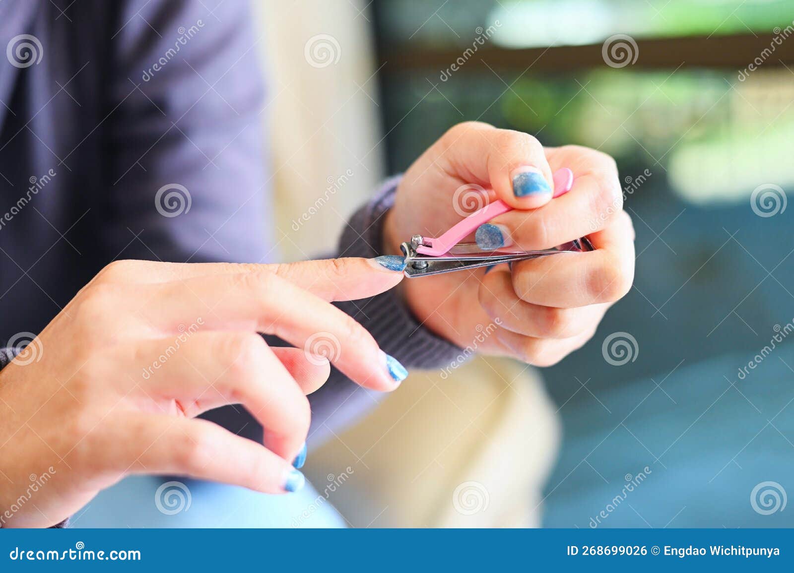 Cut Nails Concept Woman Hand Holding Nail Clipper And Cutting Nails