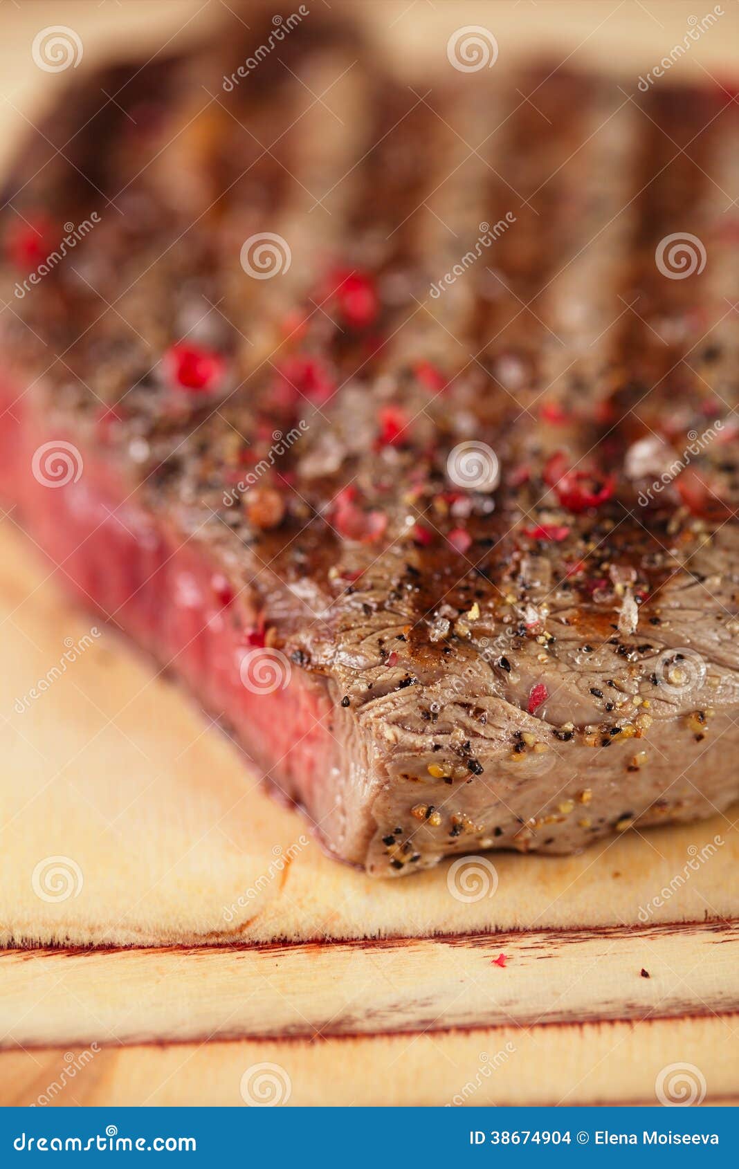 Cut Off Beef Steak on a Wooden Board and Table Stock Photo - Image of ...