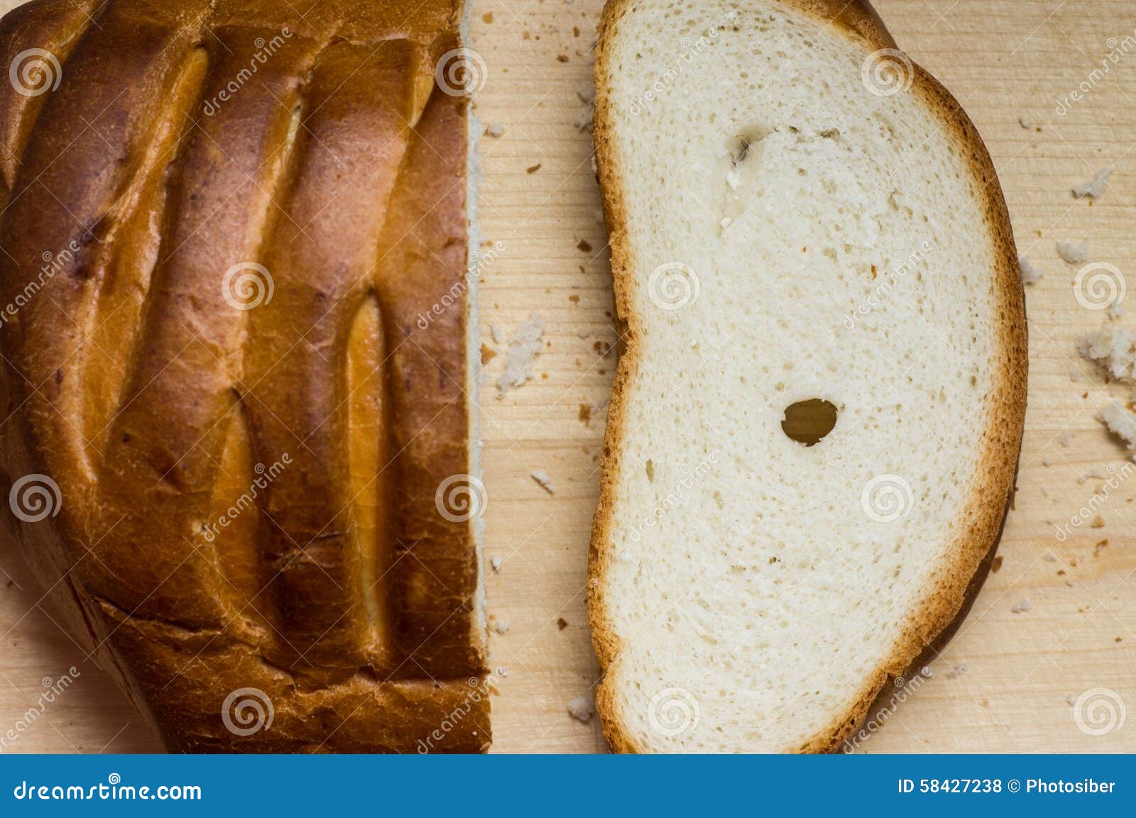 Cut Off a Piece of Loaf Bread Stock Photo - Image of food, bread: 58427238