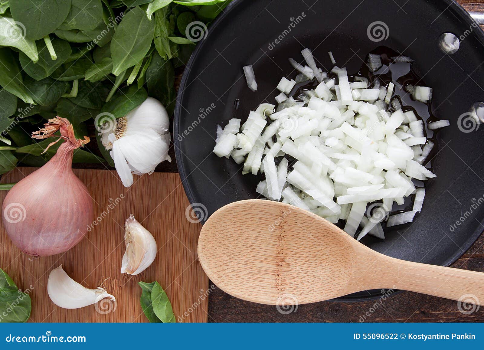 Cut onion in a frying pan stock photo. Image of ingredient - 55096522