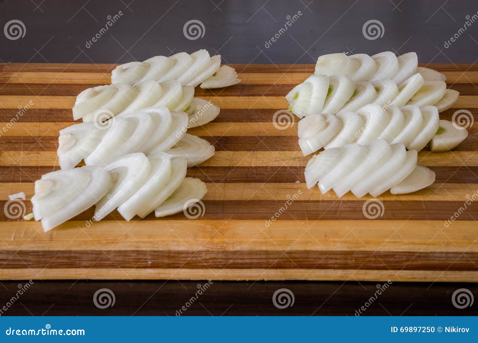 Cut Onion Half Rings on a Cutting Board for Cooking Stock Photo - Image ...