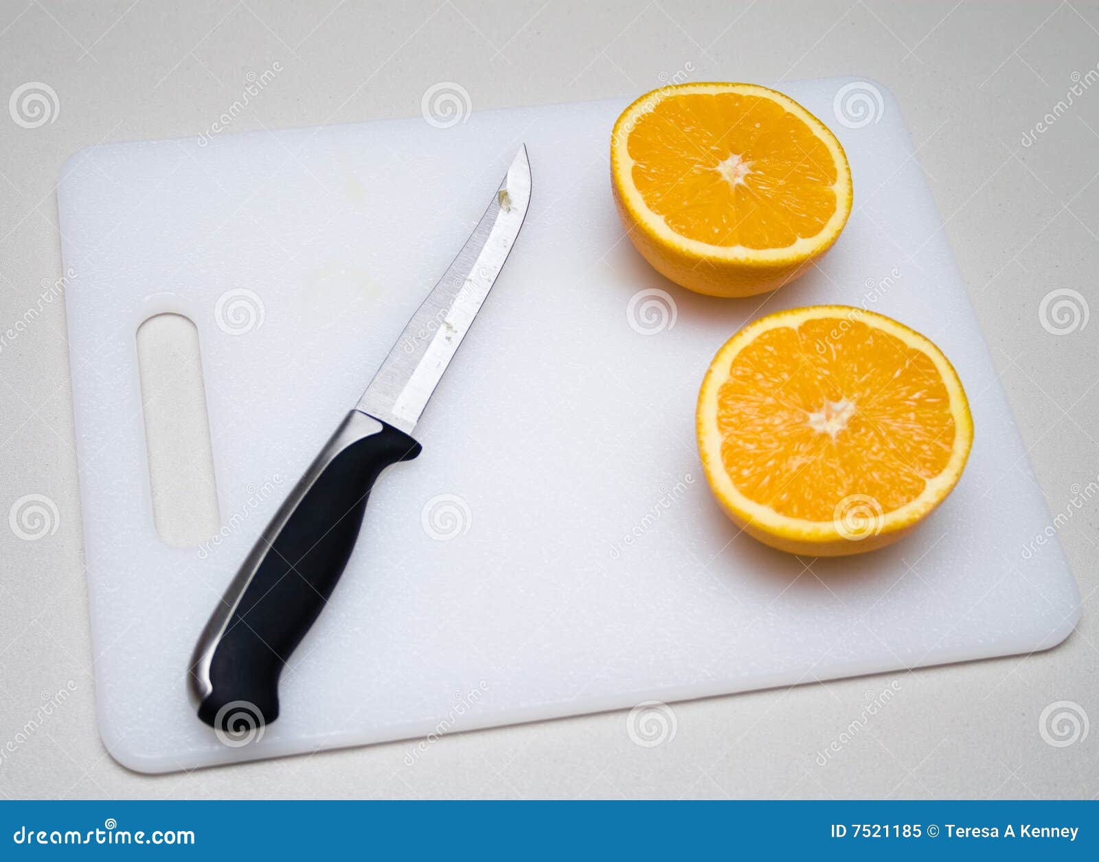 Cut orange stock image. Image of cutting, table, knife - 7521185