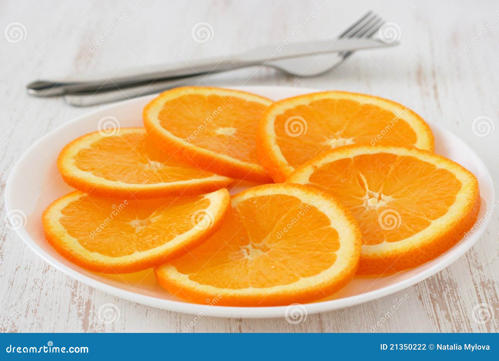 Cut orange on a plate stock photo. Image of orange, healthy - 21350222