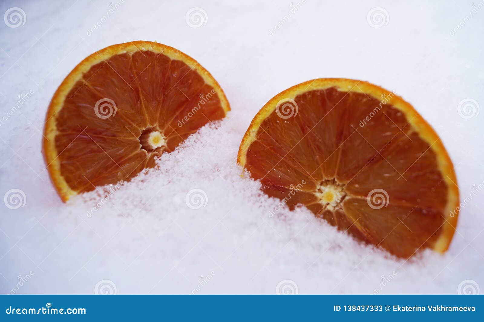 Cut Oranges in the Snow. Fruits in Winter Stock Image - Image of halved ...