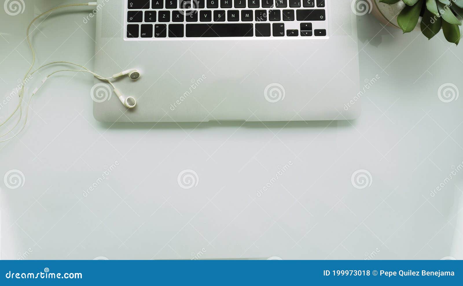 Cut-out of a Computer Keyboard and Headset on a White Surface with ...