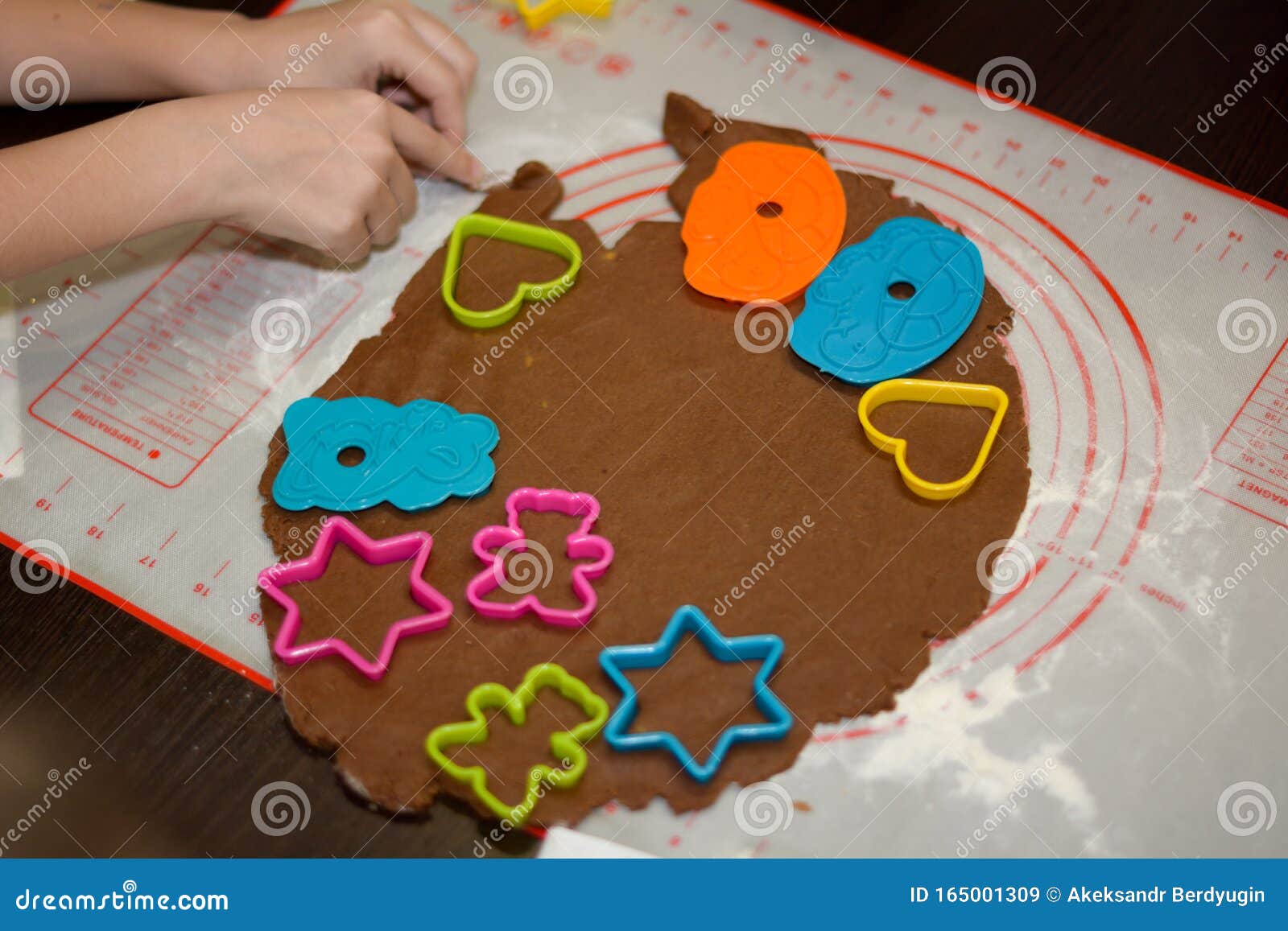 Cut Out Different Shapes of Cookies from Chocolate Dough Stock Image ...