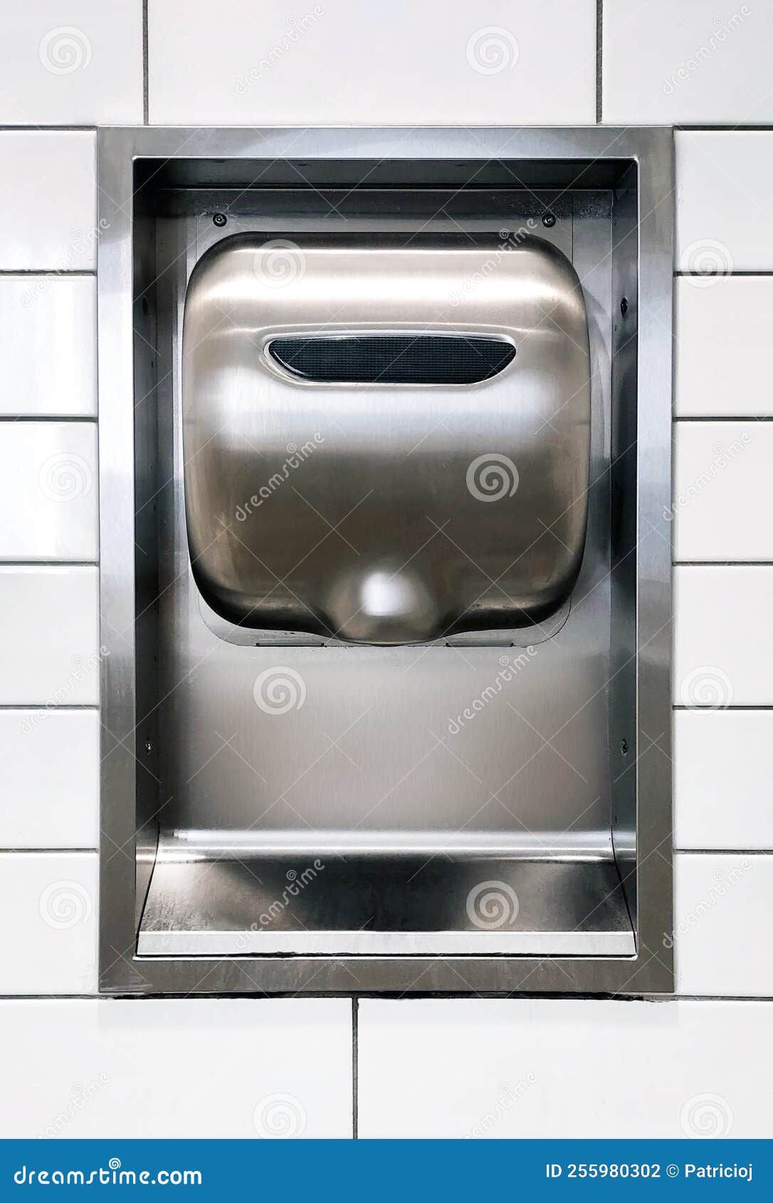 Wall Mounted Metal Hand Blower Dryer Isolated on Subway Tile Wall Stock ...