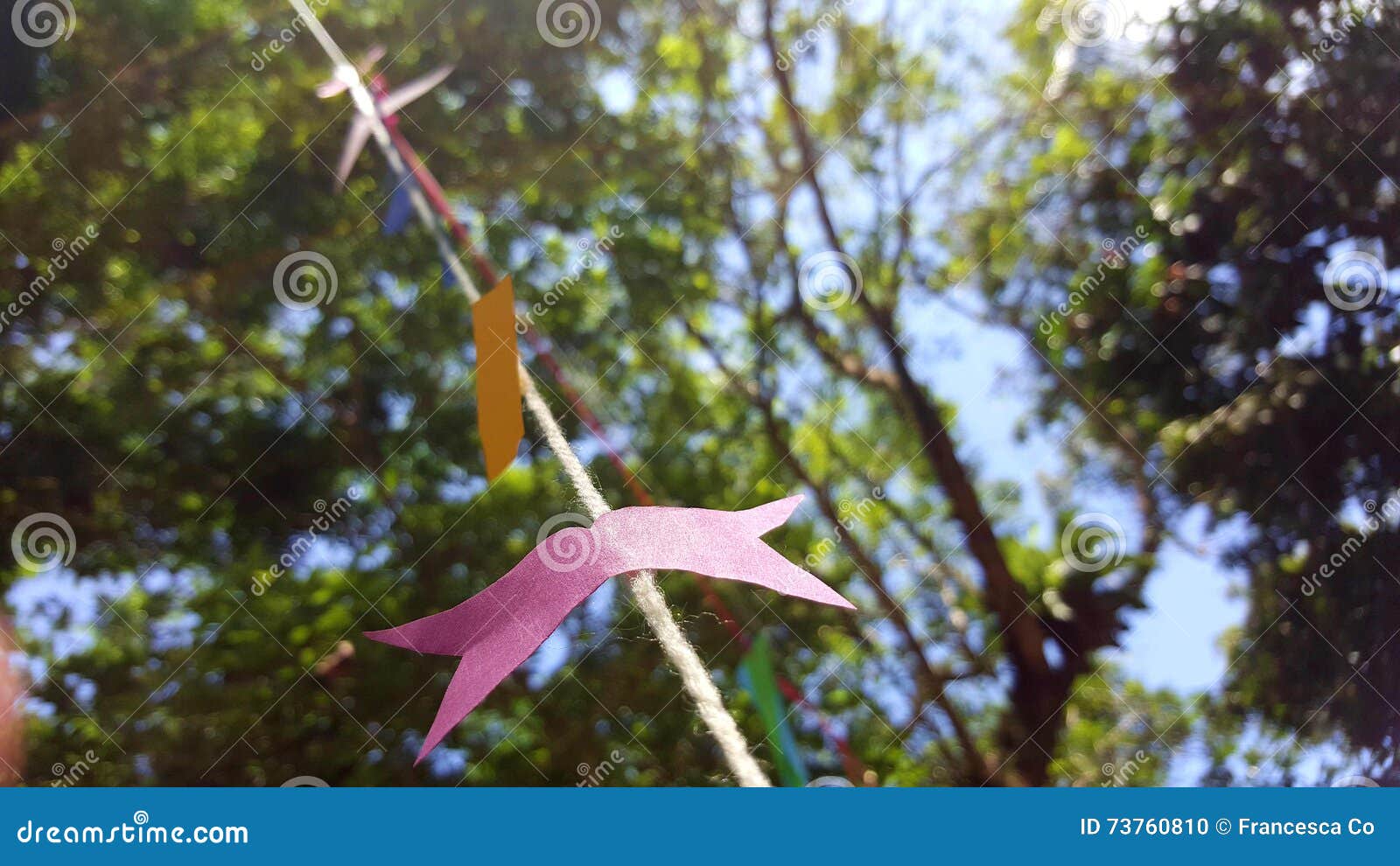 Cut Out of Papers in Strings Stock Photo - Image of papers, colorful ...