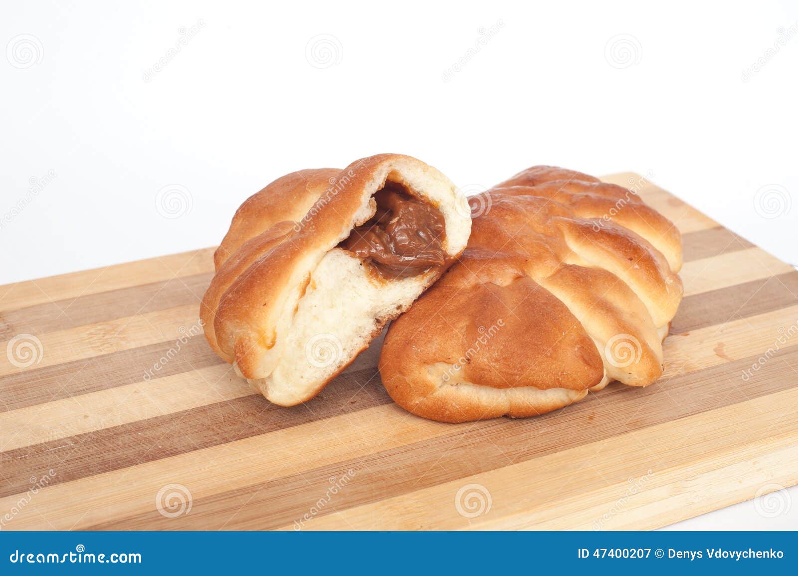 Cut an-pan on Wooden Cut Board Stock Image - Image of slice, wooden ...