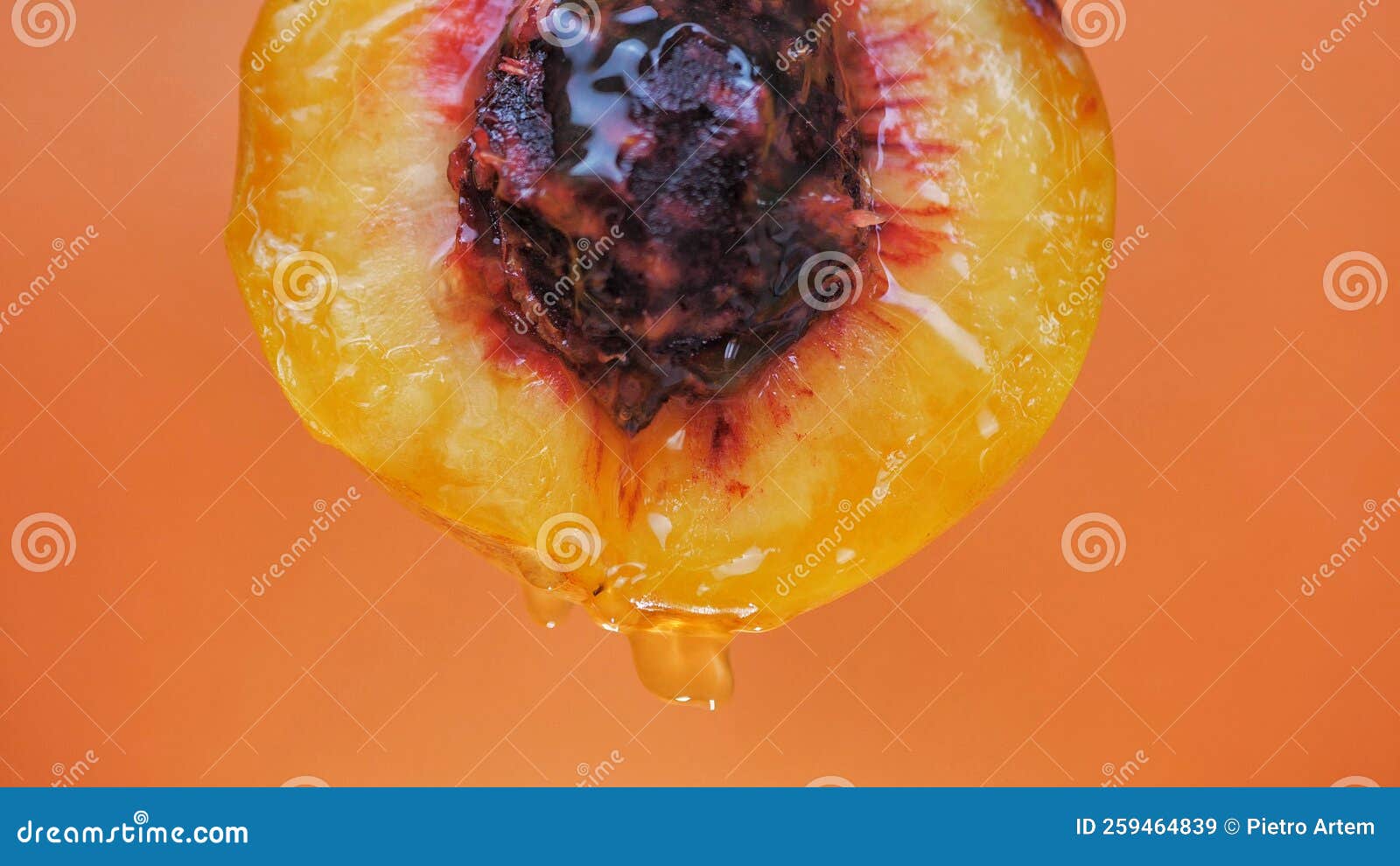 Cut Peach with Juice Dripping on an Orange Background Stock Image ...
