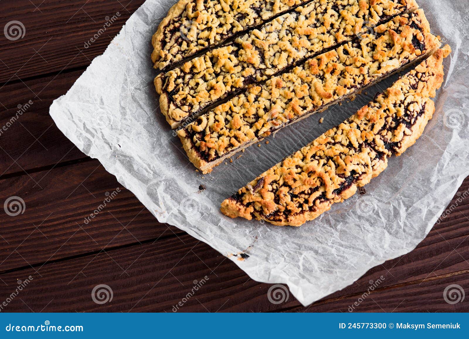 Cut Pie into Portion Pieces for Cooking on a Wooden Brown Table. View ...