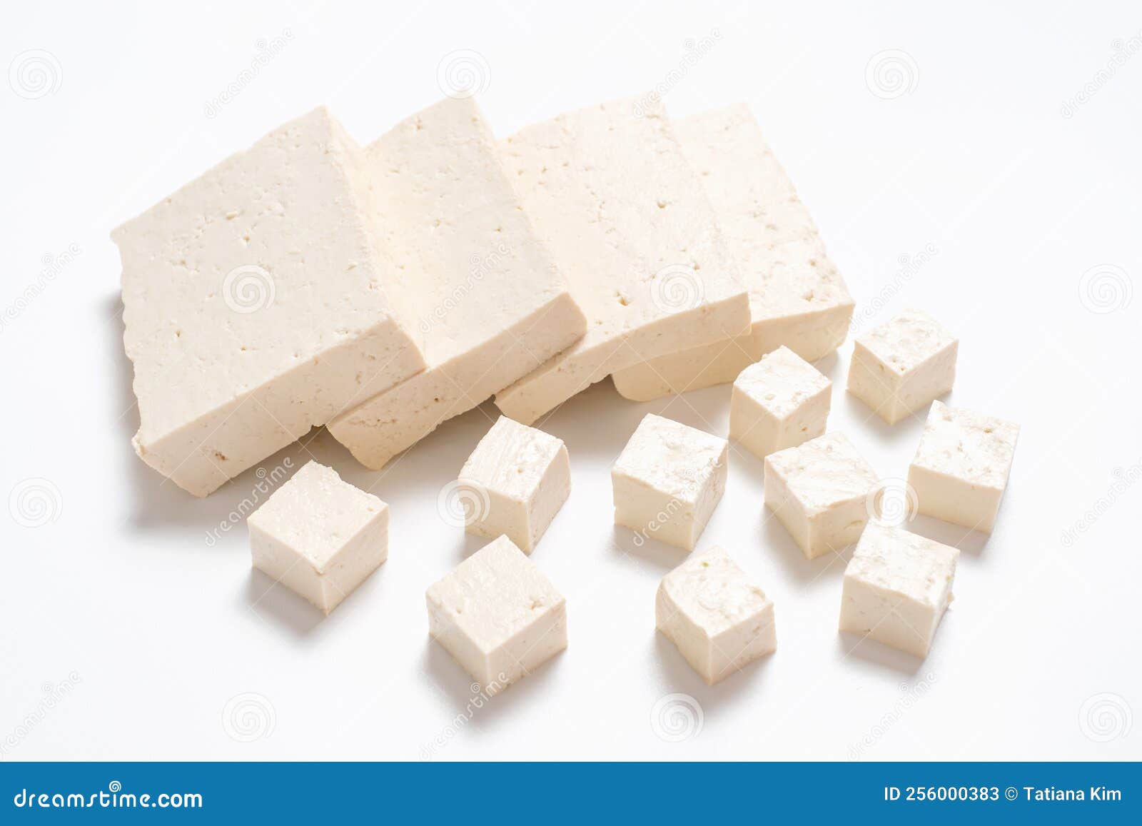 Cut into Pieces and Cubes of Tofu Close-up on White Background. Stock ...
