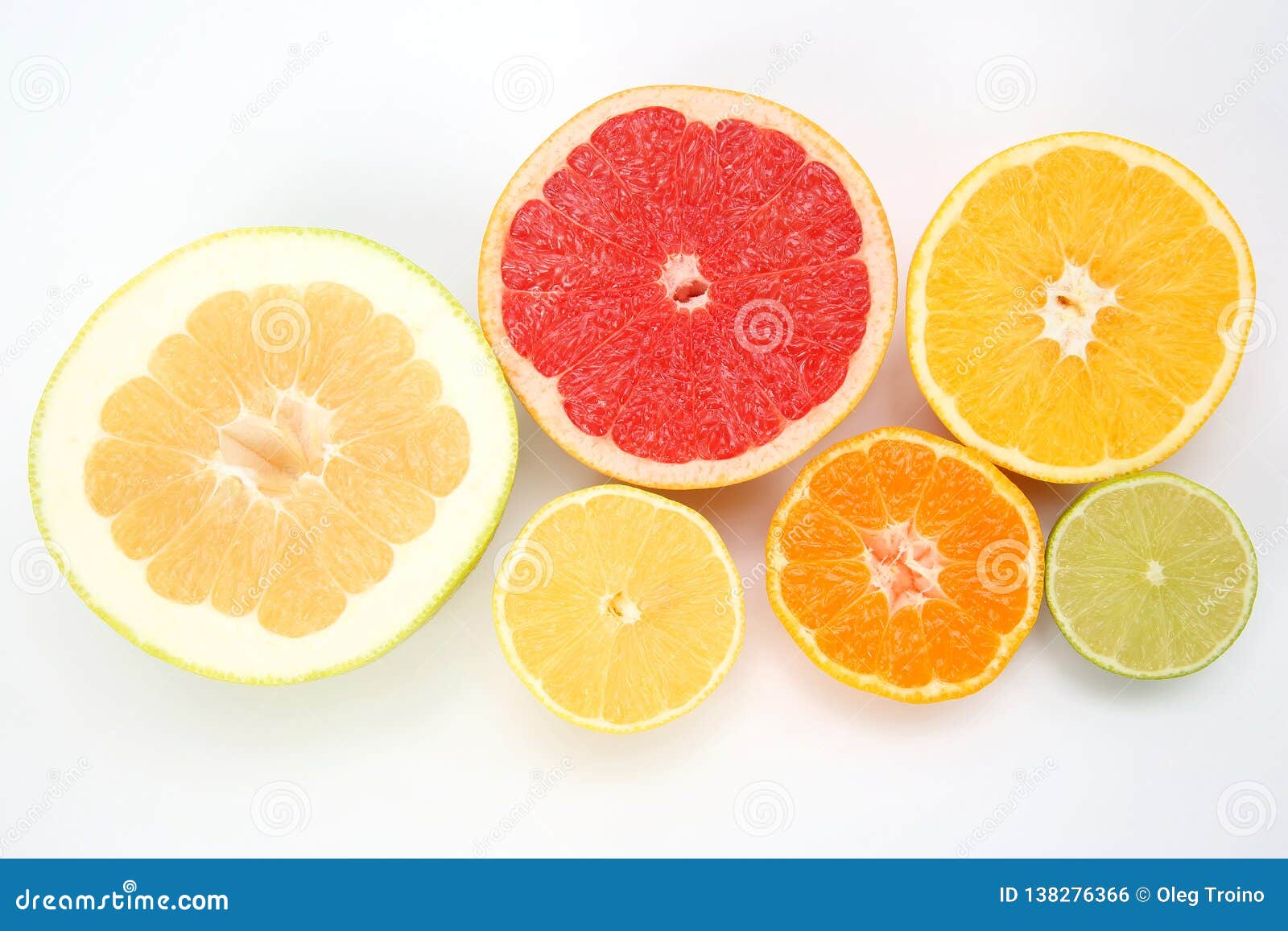 Cut Pieces of Different Citrus Fruits on White Background Stock Photo ...