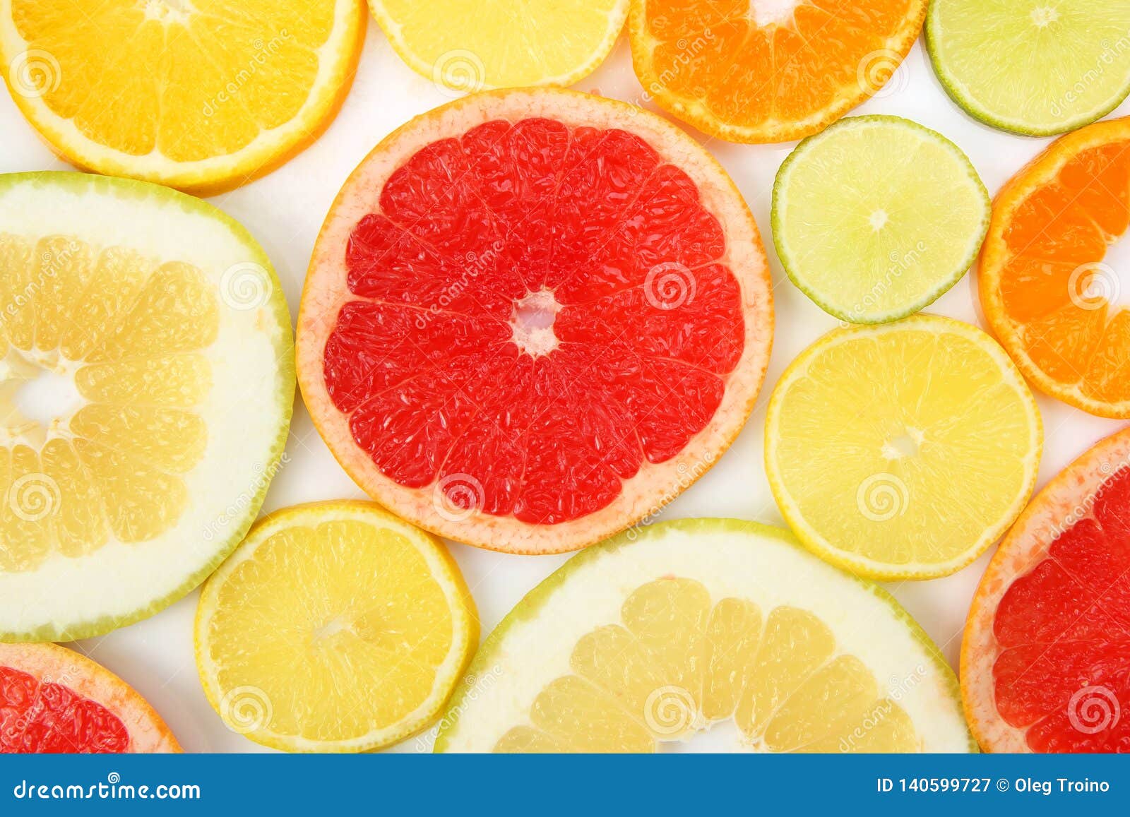 Cut Pieces of Different Citrus Fruits on White Background Stock Image ...