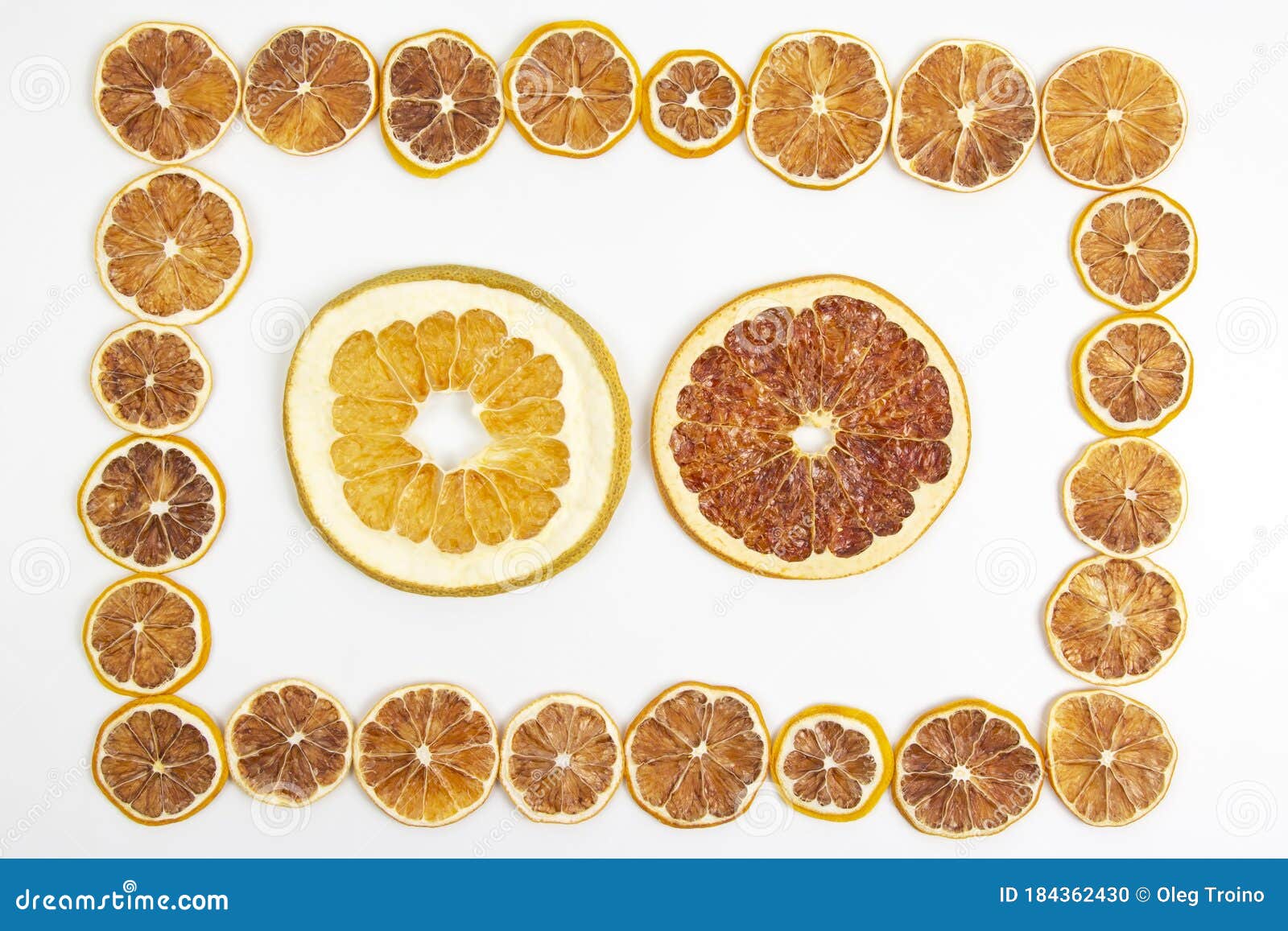 Cut Pieces of Different Citrus Fruits on White Background Stock Photo ...