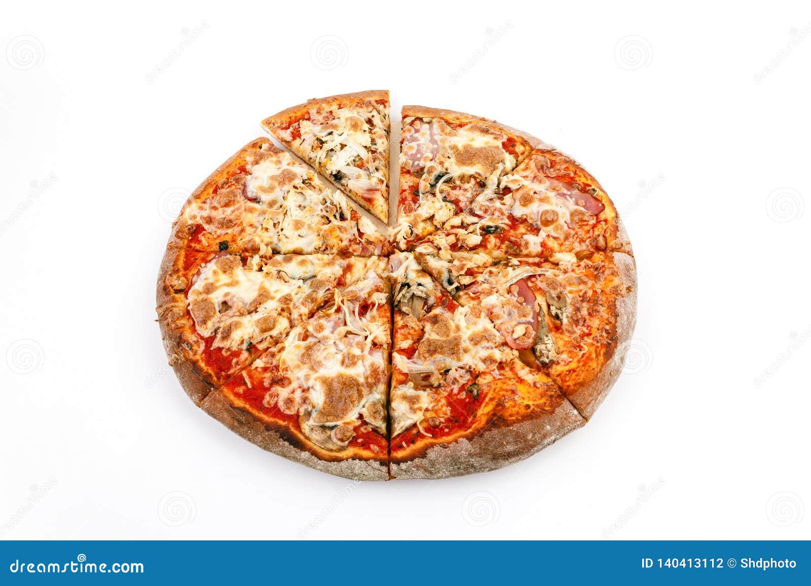 Cut Pizza Close Up with Cheese Ham and Tomato on a White Stone ...