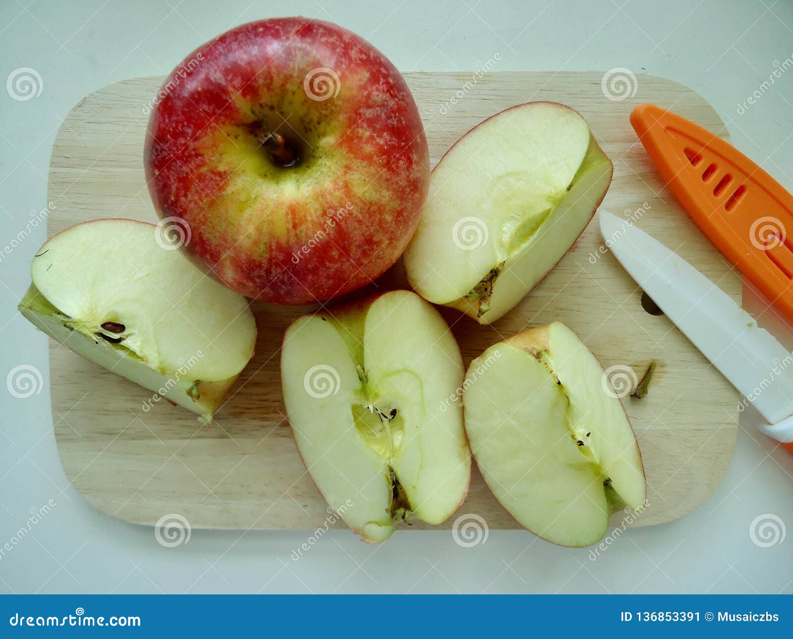 Cut red apple stock image. Image of eatable, fruit, block - 136853391