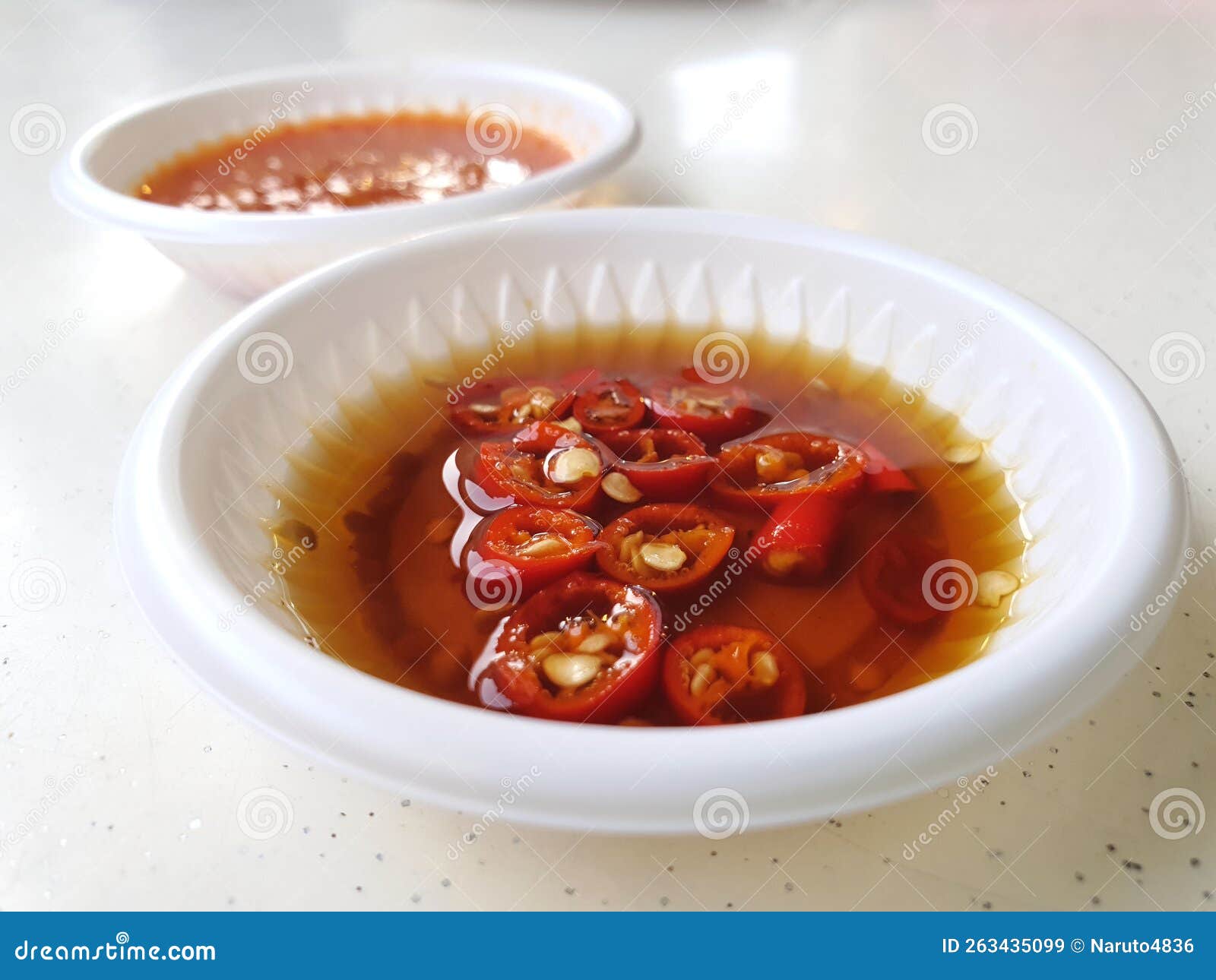 Cut Red Chilli in Soy Sauce Stock Image - Image of close, brown: 263435099