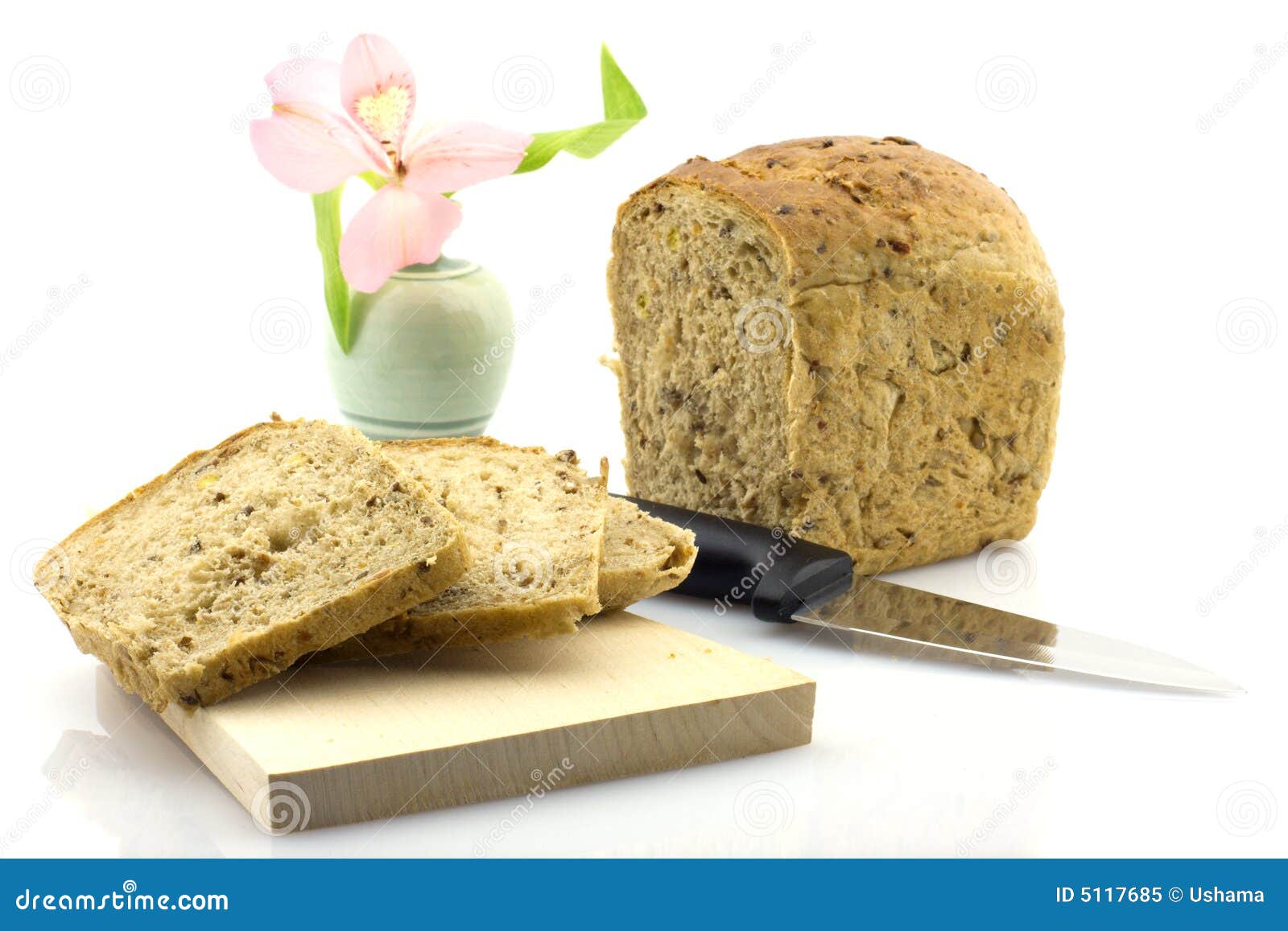 Cut Rye Bread Loaf and a Flower in a Vase, Isolate Stock Image - Image ...