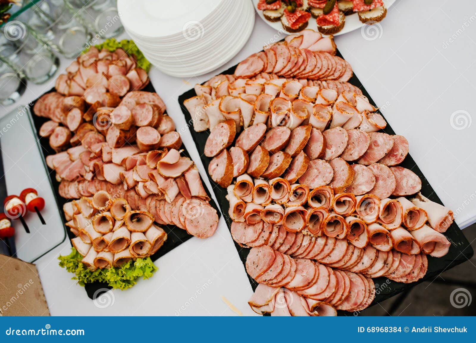 Cut Sausage and Ham on the Buffet Table Stock Photo - Image of finger ...
