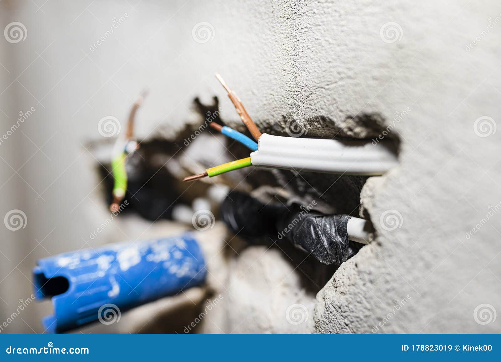 Cut Single-phase Cable In The Wall Of The House. Phase, Neutral And ...