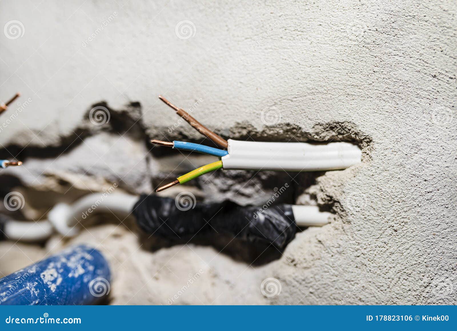 Cut Single-phase Cable in the Wall of the House. Phase, Neutral and ...