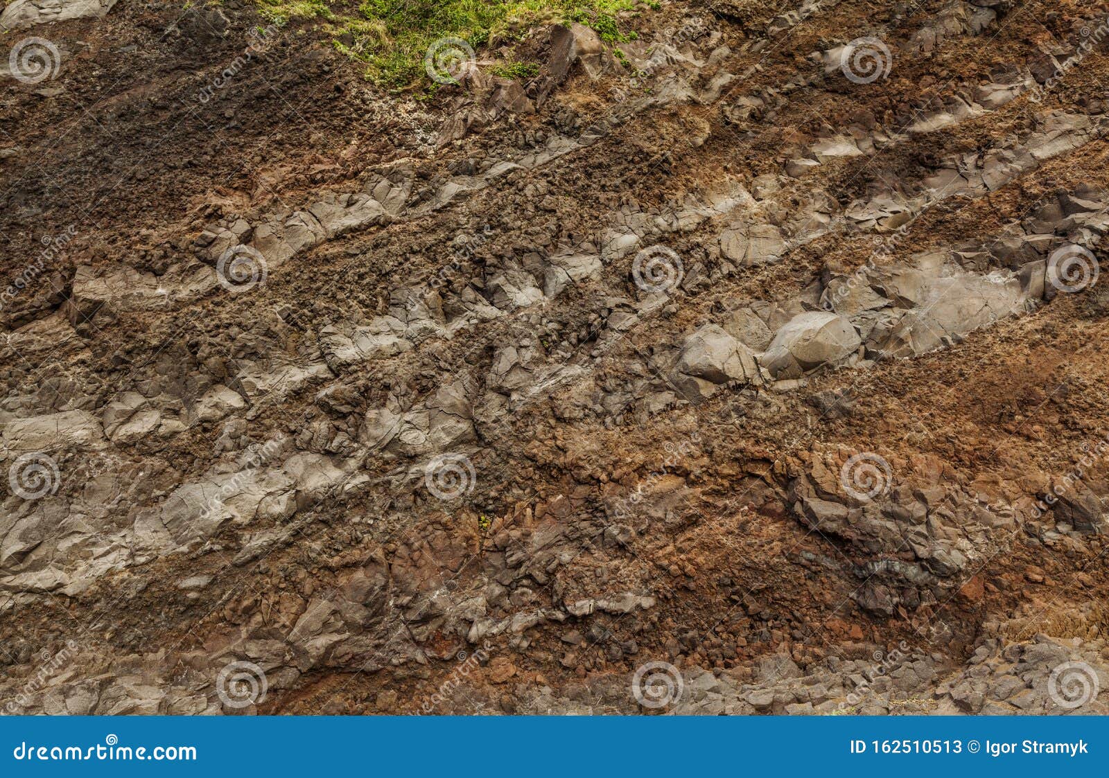 A Cut of Soil with Rocks and Red Soil Stock Image - Image of sand ...