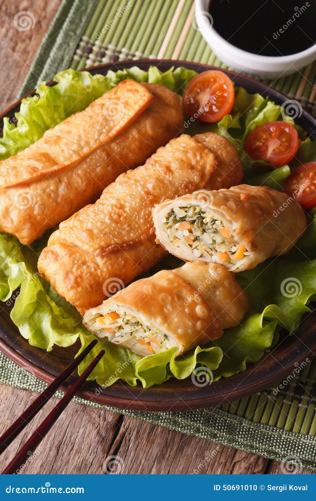 Cut Spring Rolls Fried with Sauce Closeup Vertical, Top View Stock ...