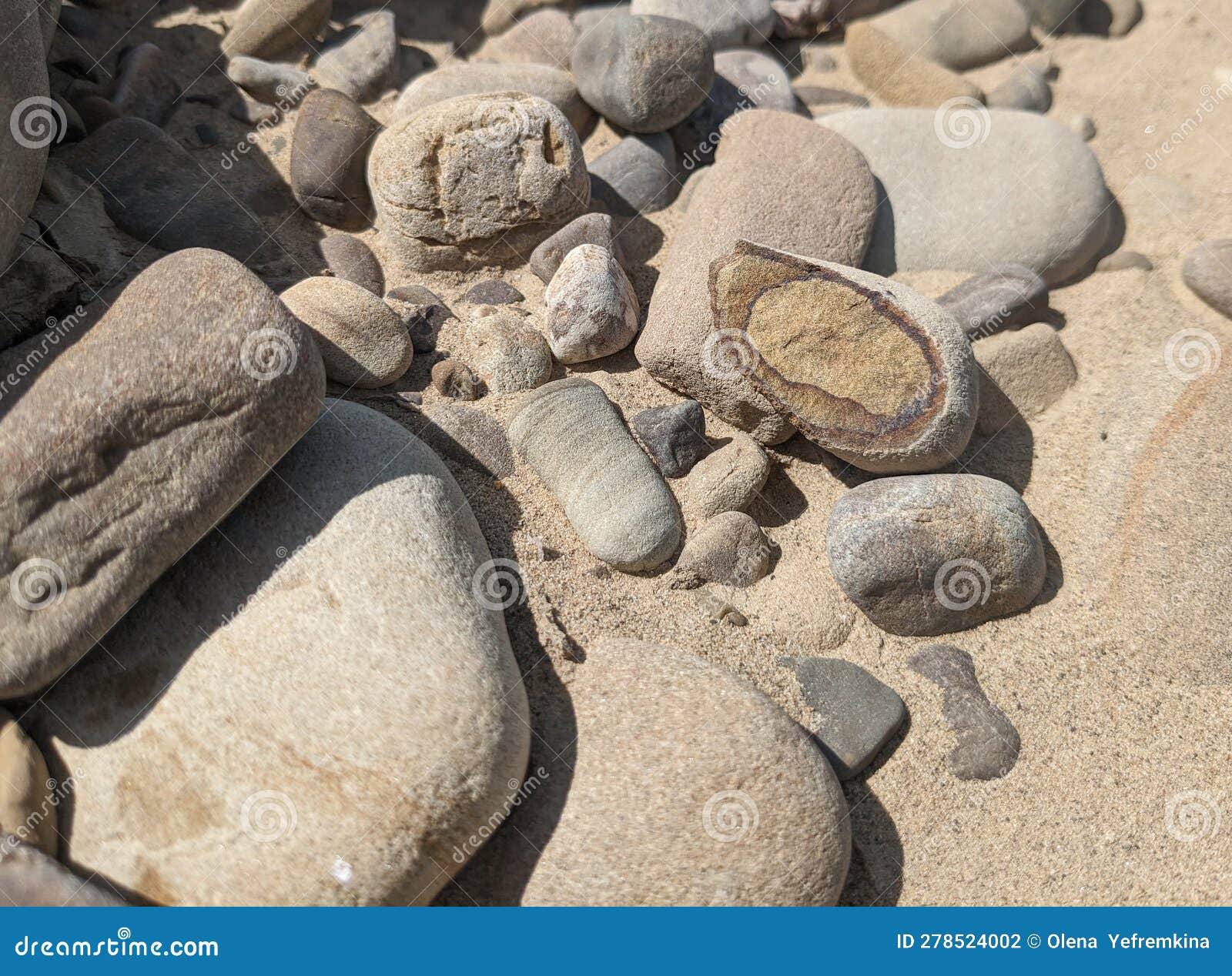 A Cut of Stone, Pebbles with Different Layers of Minerals. Stock Photo ...