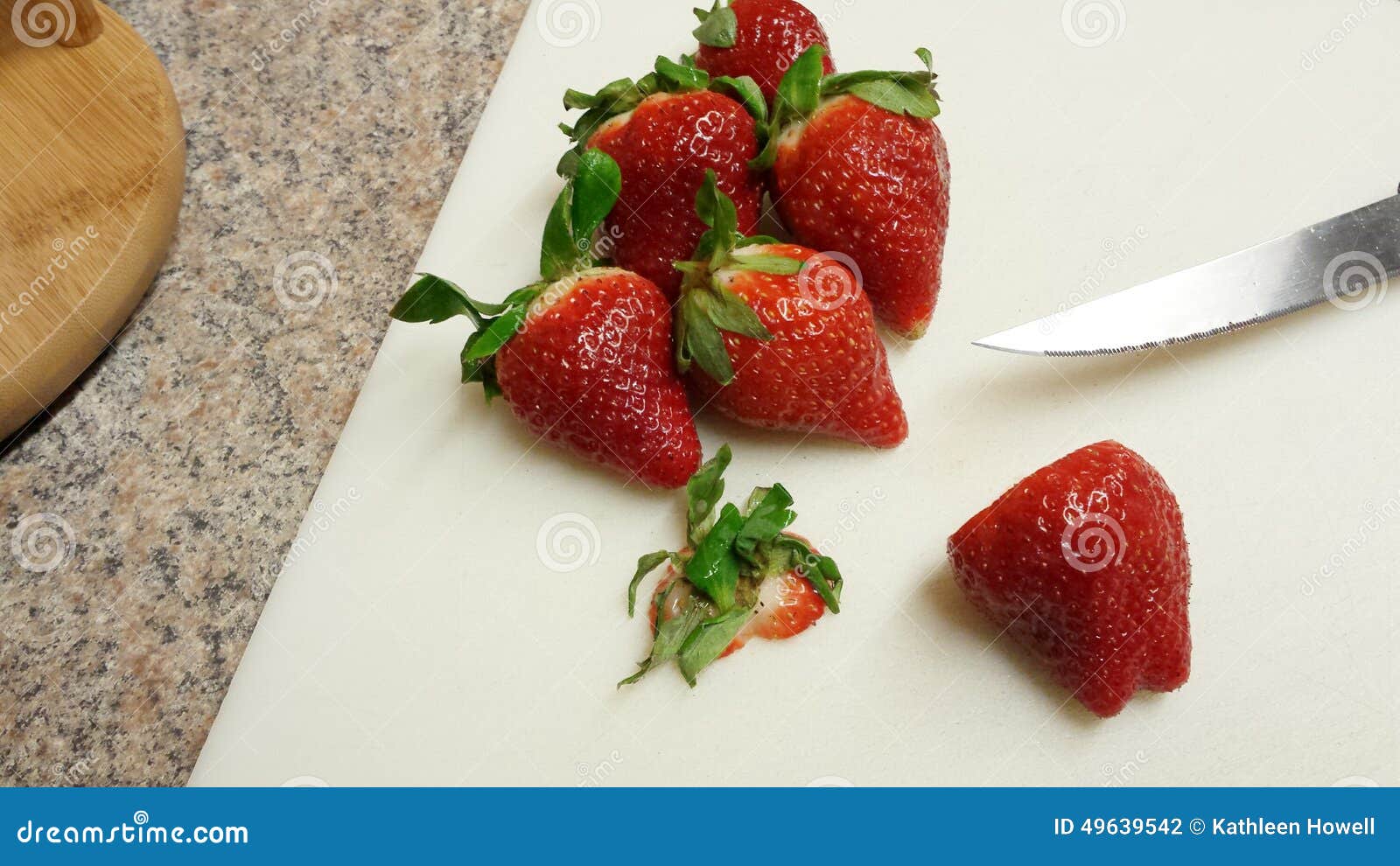 Cut strawberry stock photo. Image of fruit, utensil, knife - 49639542