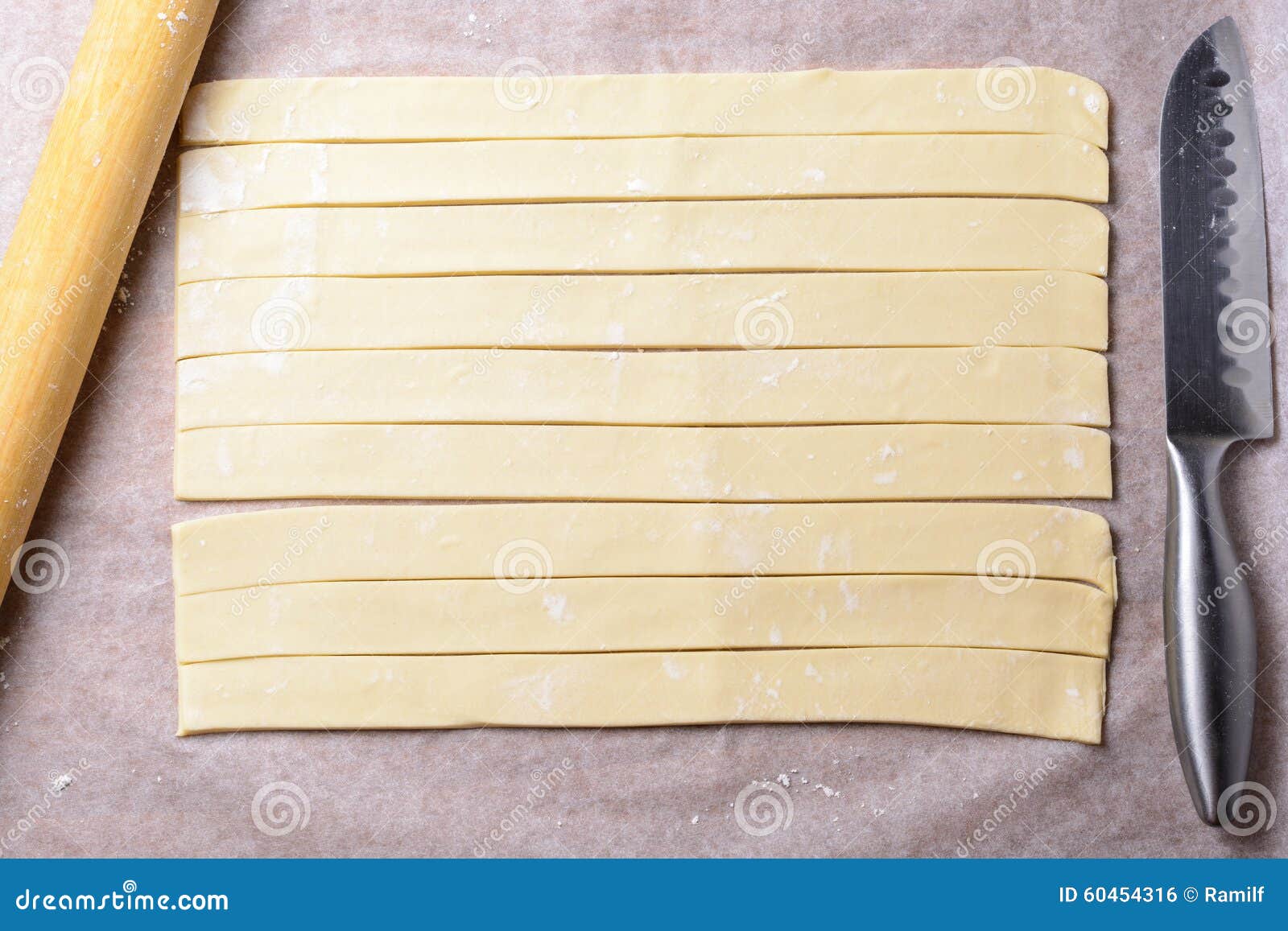 Cut into Strips of Dough on Baking Paper Stock Photo - Image of rolling ...