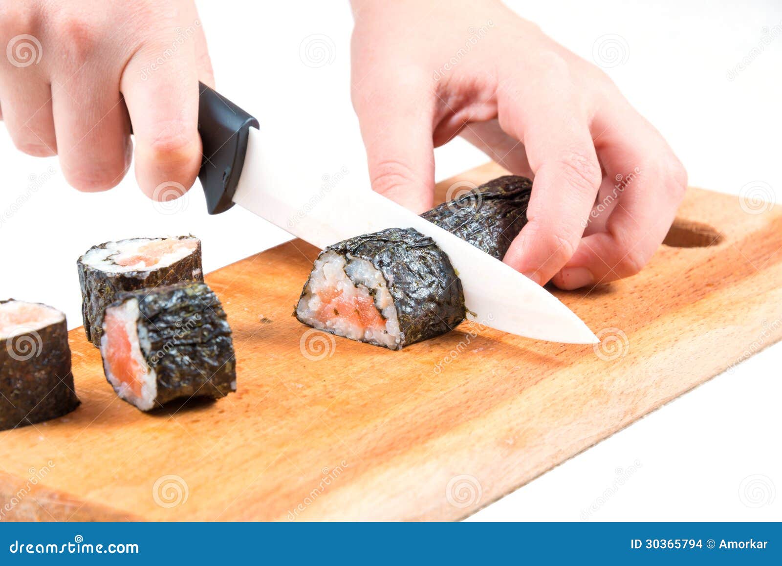 Cut sushi roll stock photo. Image of knife, kitchen, making - 30365794