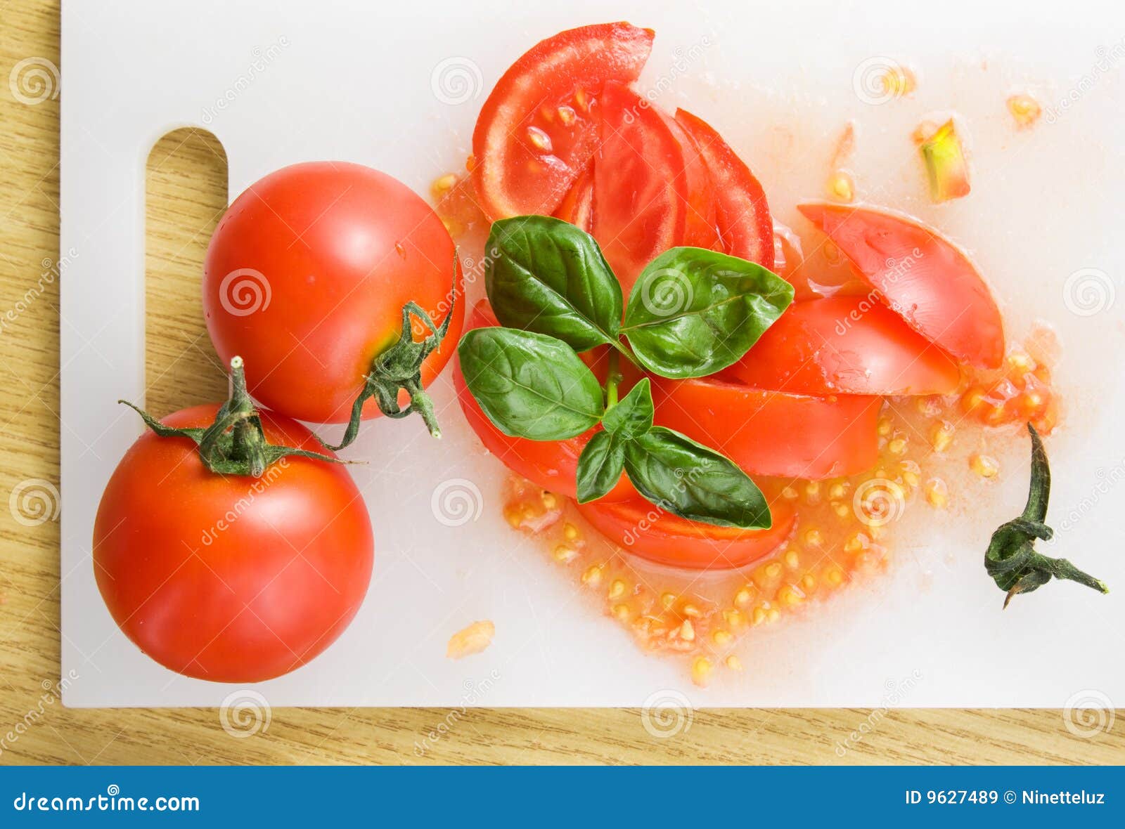 Cut tomatoes stock image. Image of table, close, preparation - 9627489