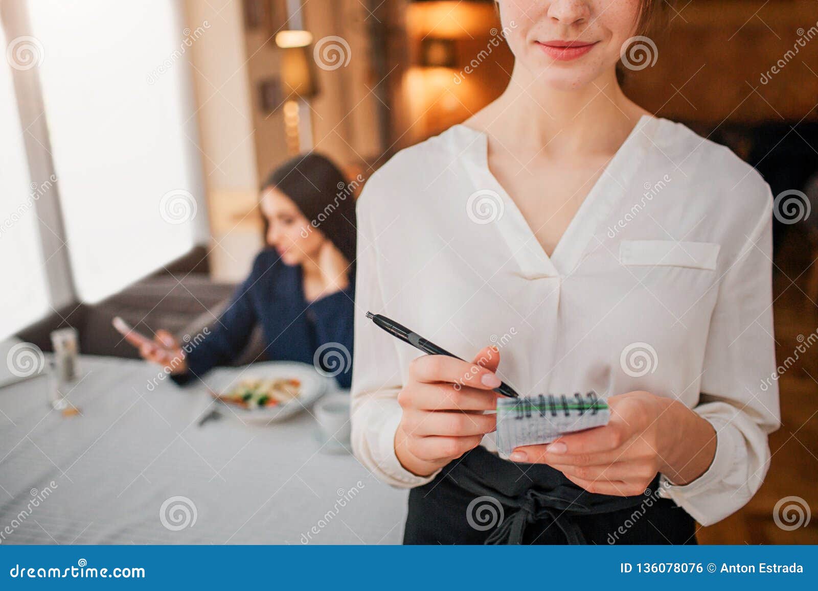 Cut View of Young Waitress Write Order into Notebook. Female Customer ...