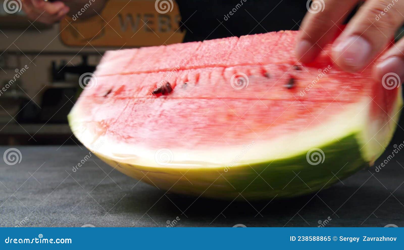 We Cut the Watermelon into Small Square Pieces with a Knife. Stock ...